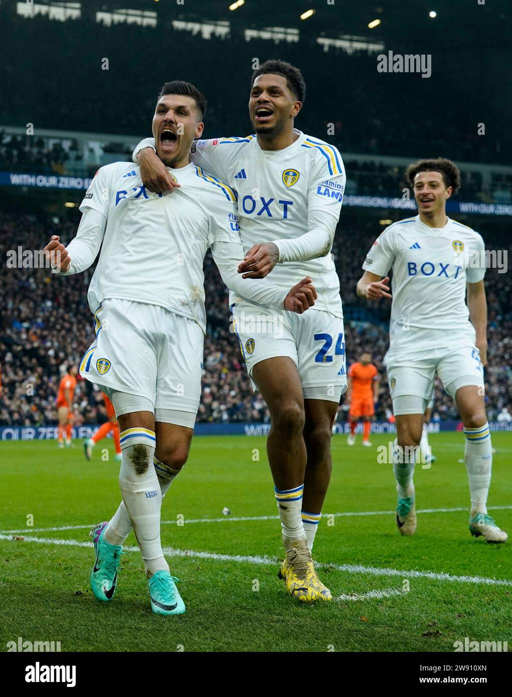 Leeds United's Joel Piroe (left) celebrates scoring his sides fourth ...