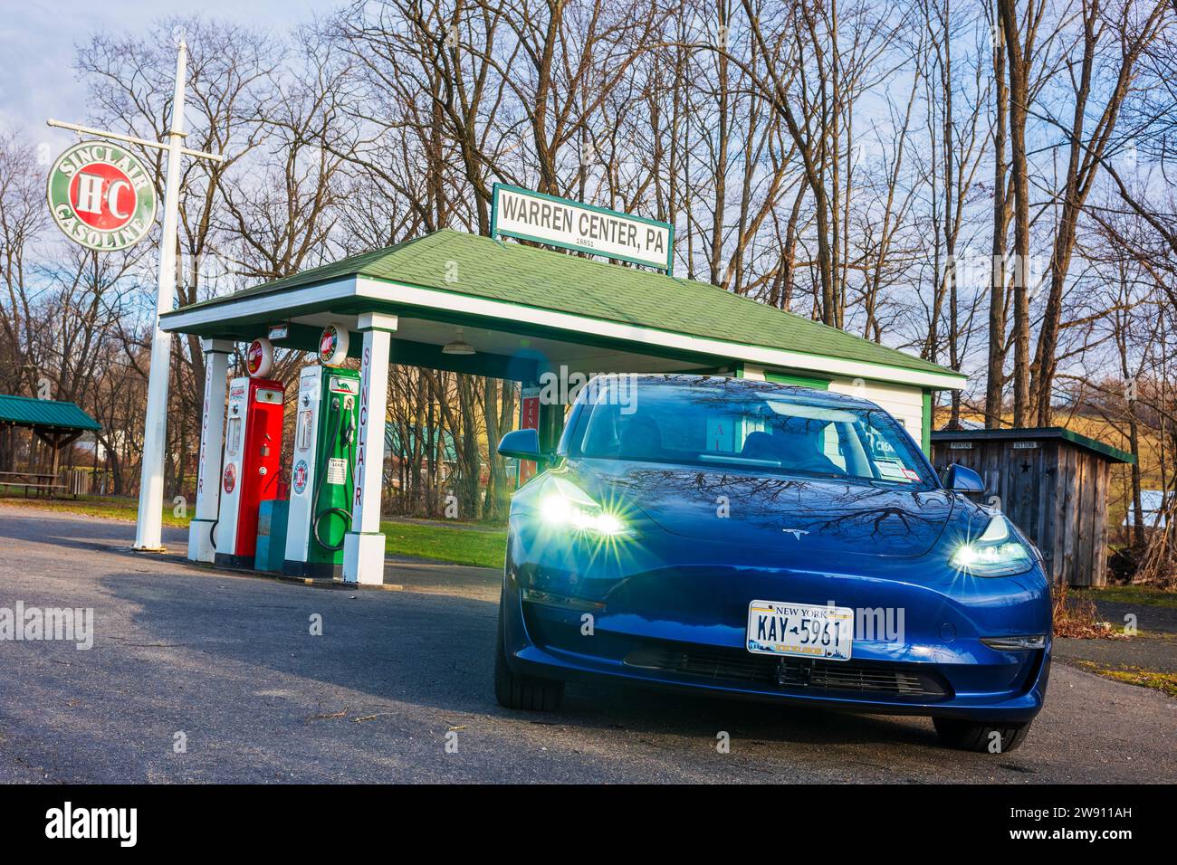 Warren Center, PA, USA - Dec 22, 2023: A blue Tesla Model 3, an ...