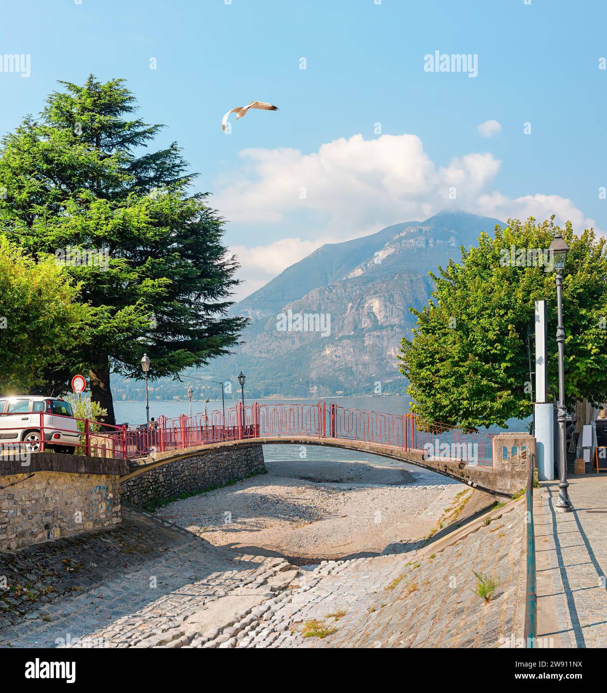 Italy, Varenna, Lake Como. Bridge and water canal Stock Photo - Alamy