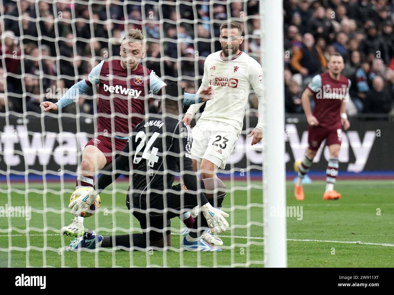 West Ham United's Jarrod Bowen (left) scores their side's first goal of ...