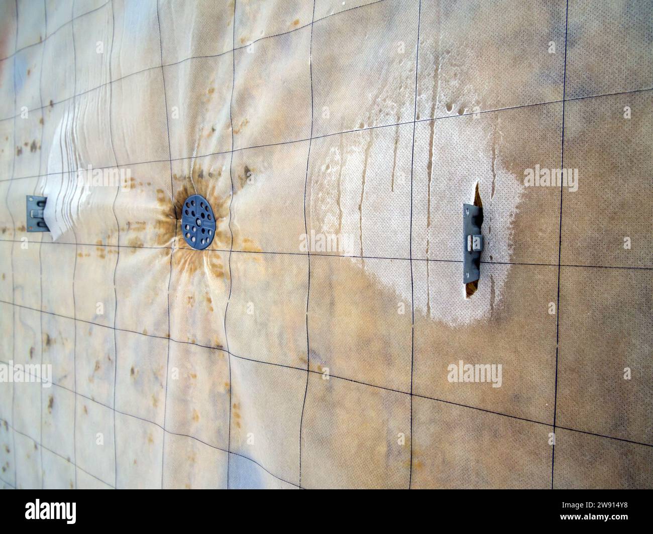 Wet insulation with frost spots Stock Photo - Alamy