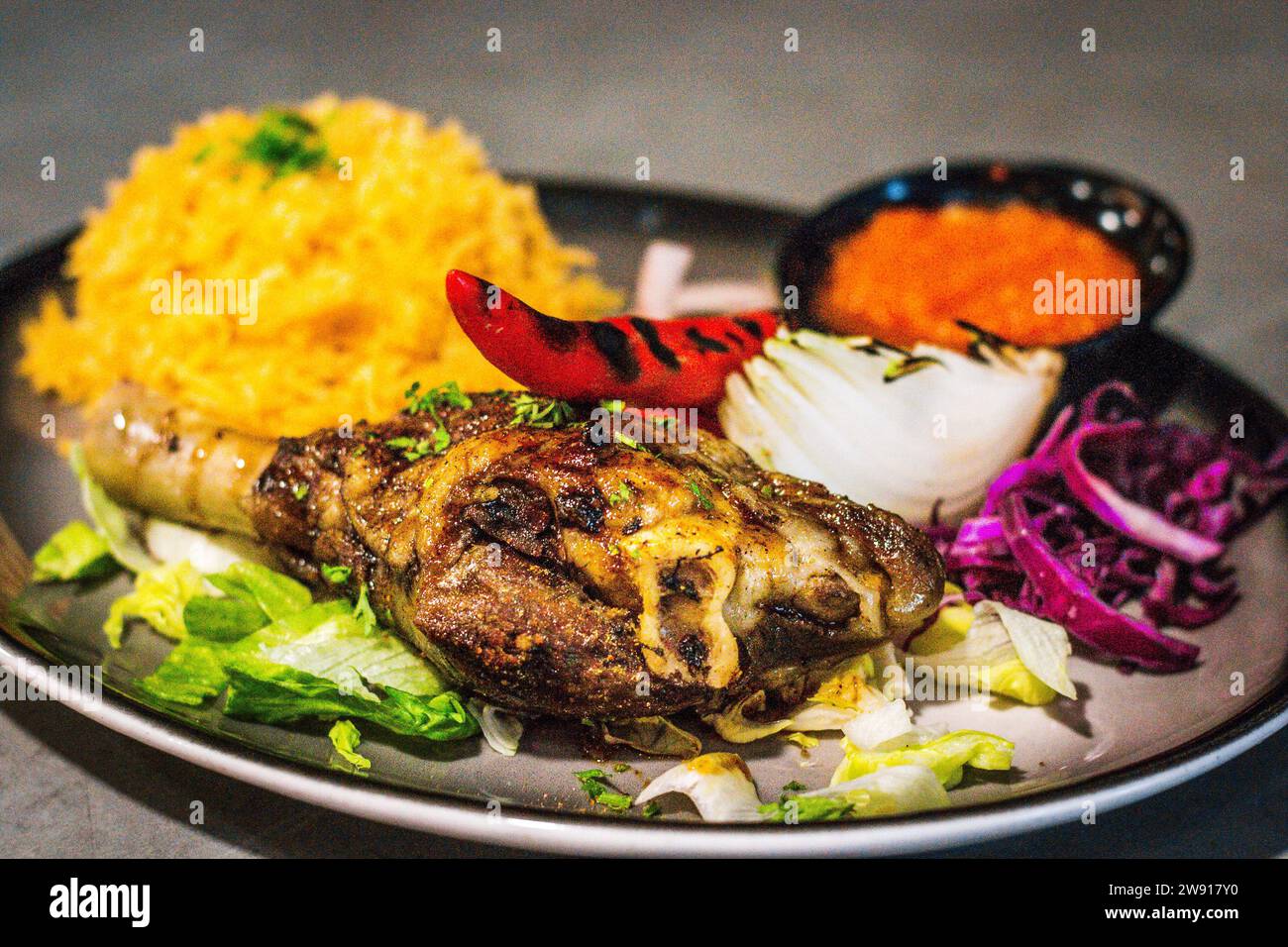Main Course of Lamb Mandi served with basmatic rice, grilled chilli ...