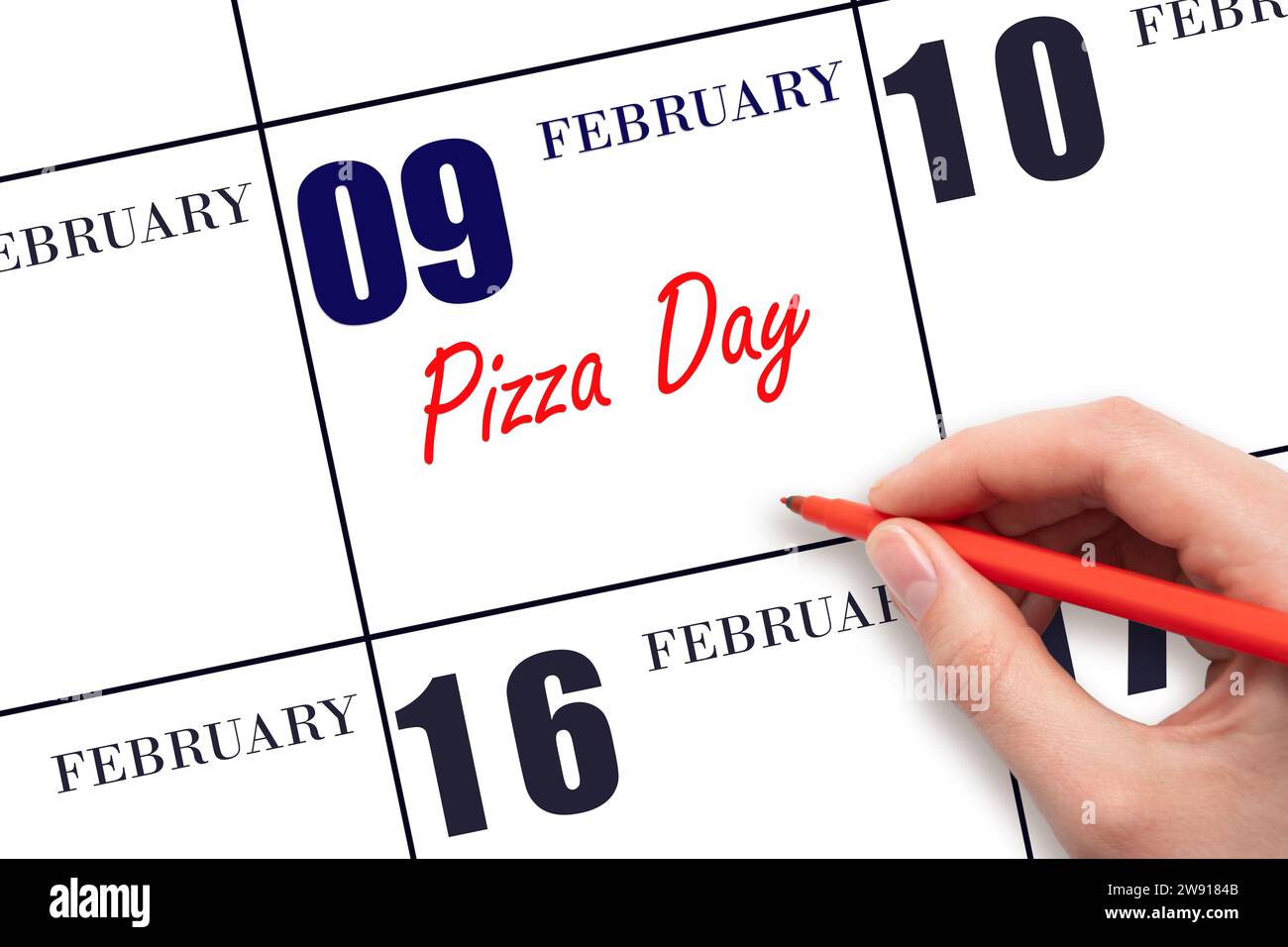 February 9. Hand writing text Pizza Day on calendar date. Save the date ...