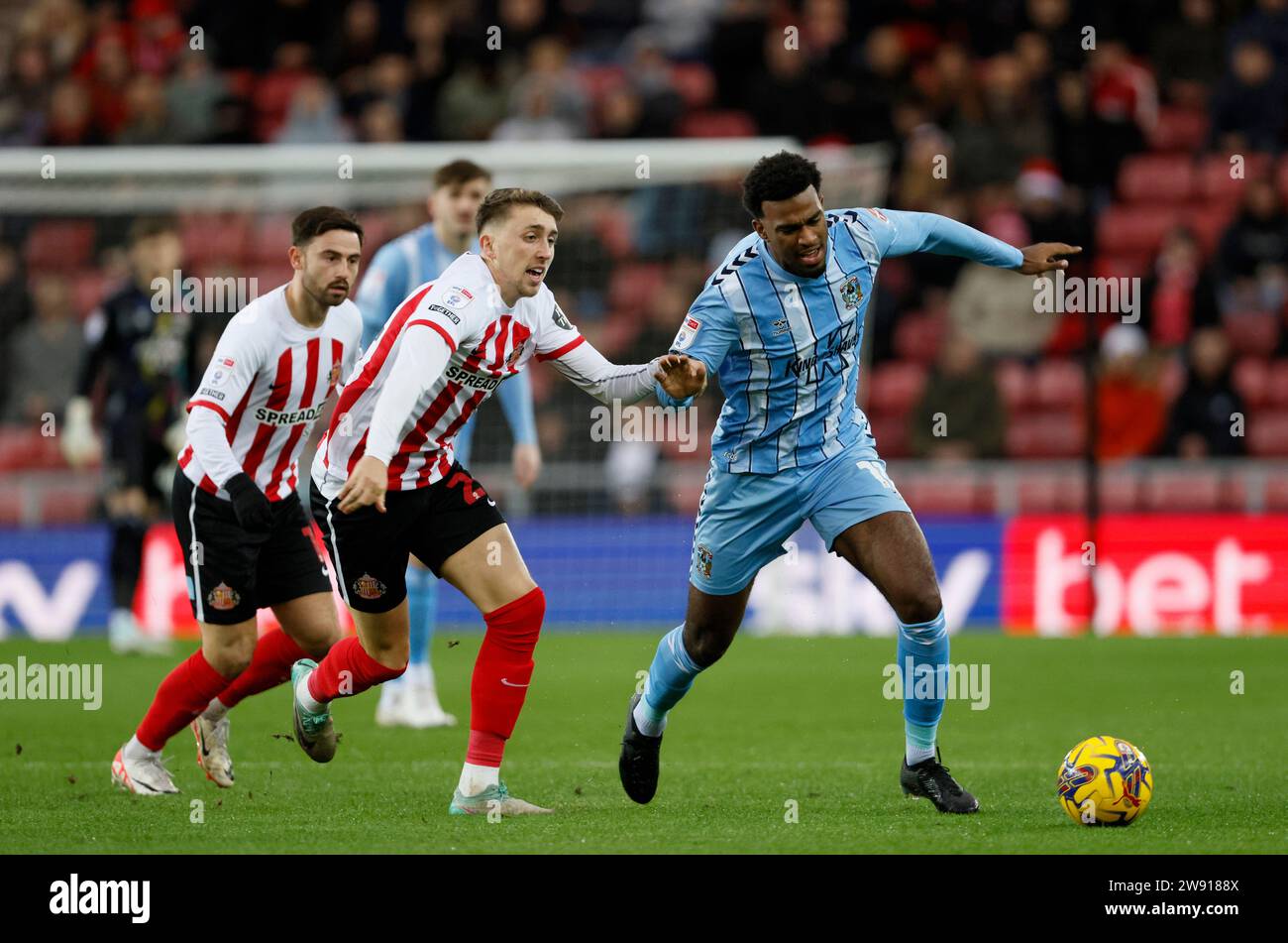 Sunderland's Dan Neil (left) and Coventry City's Haji Wright battle for ...