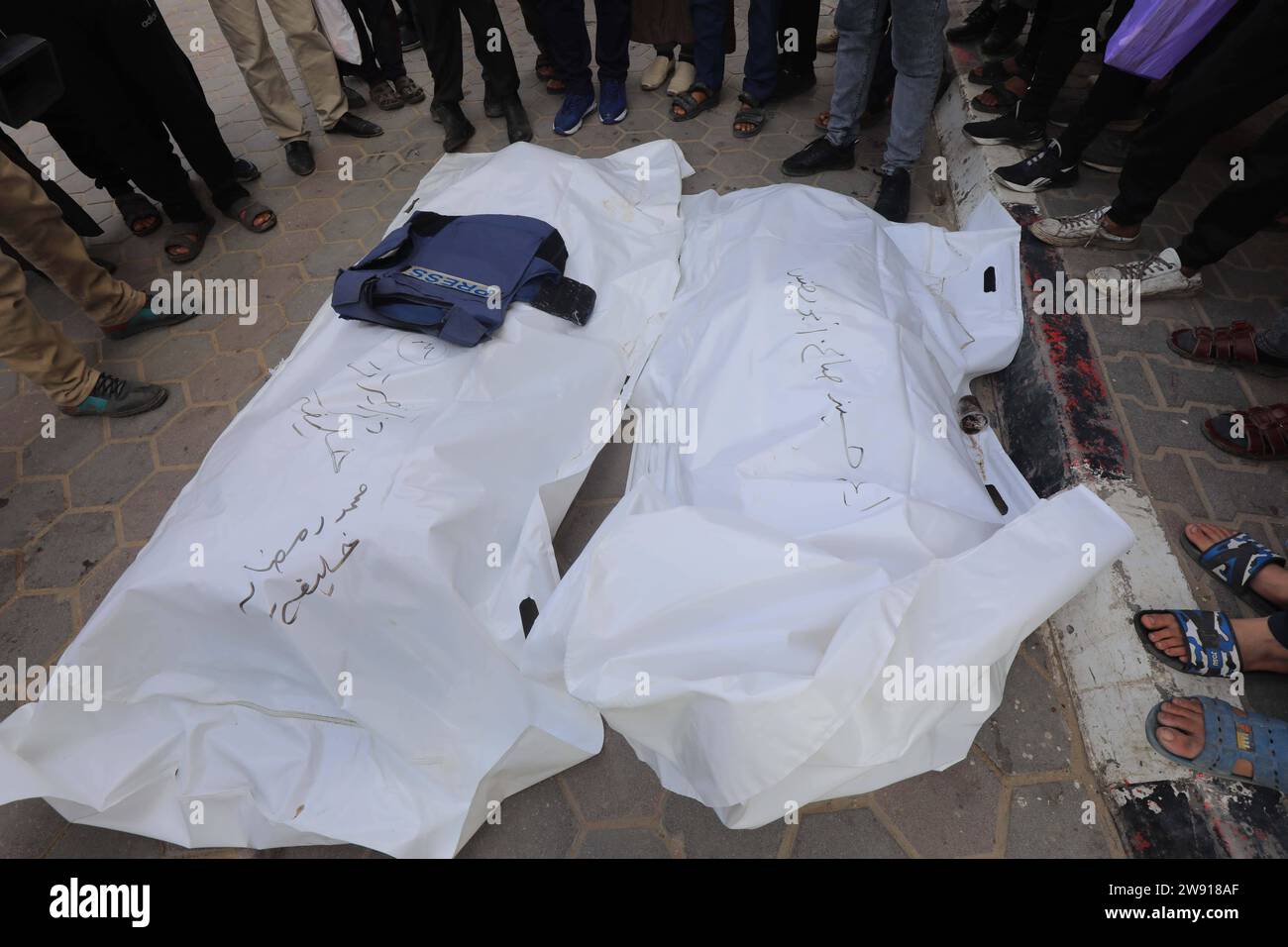 Relatives of the Palestinians died in Israeli attacks, mourn as they ...