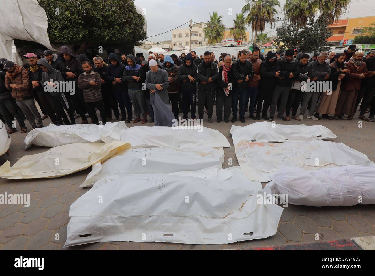 Relatives of the Palestinians died in Israeli attacks, mourn as they ...