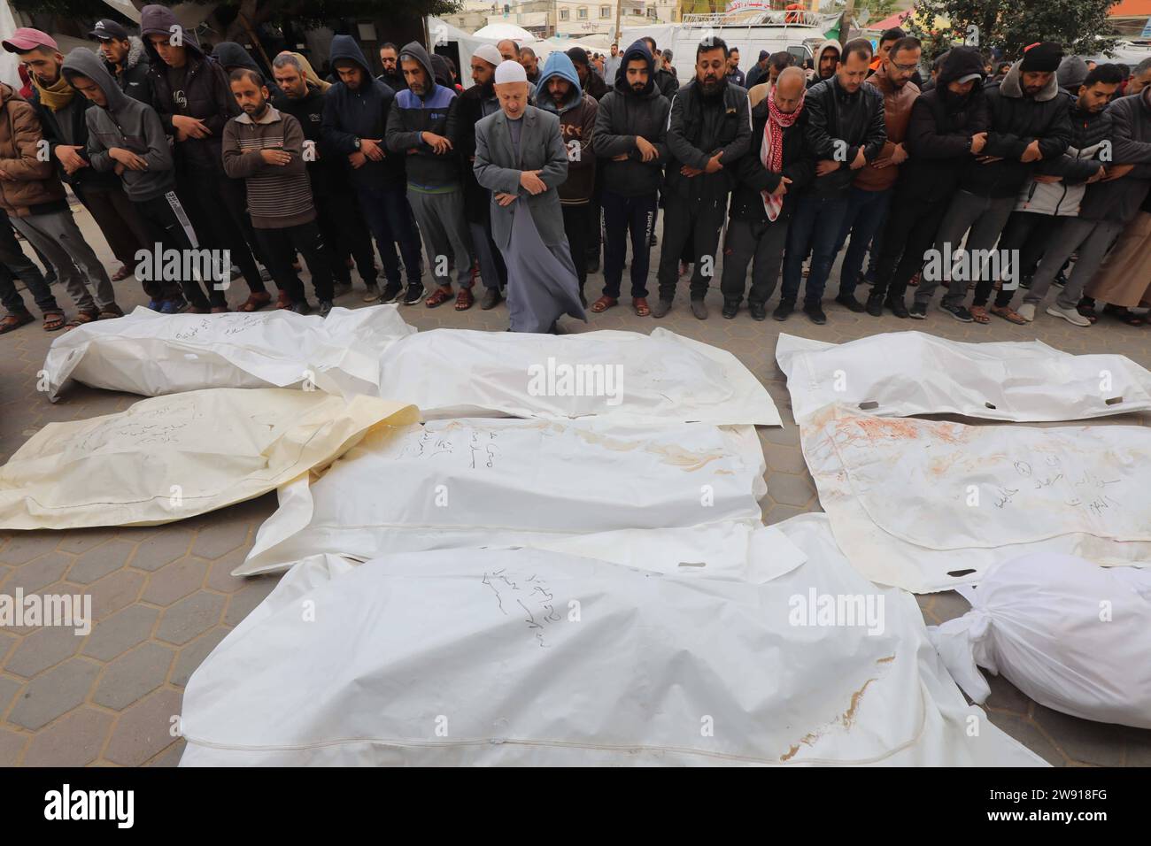 Relatives of the Palestinians died in Israeli attacks, mourn as they ...