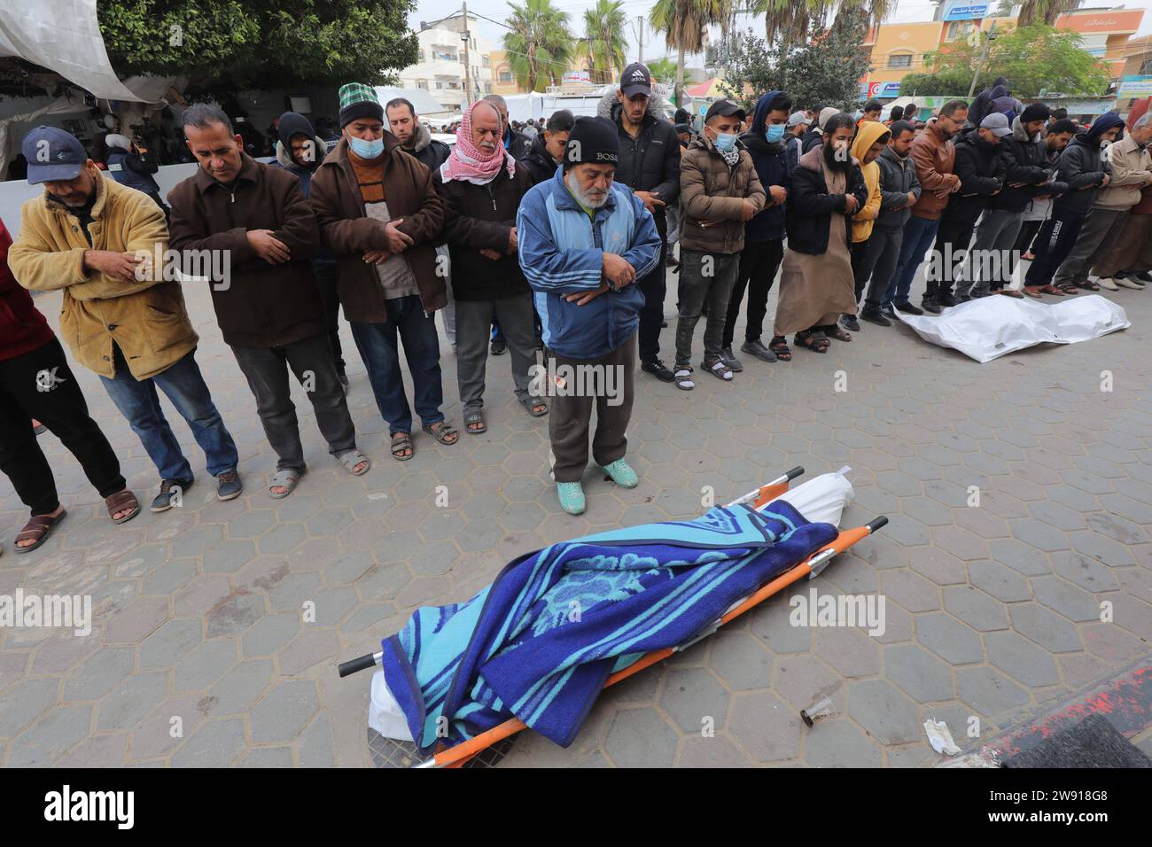 Relatives of the Palestinians died in Israeli attacks, mourn as they ...