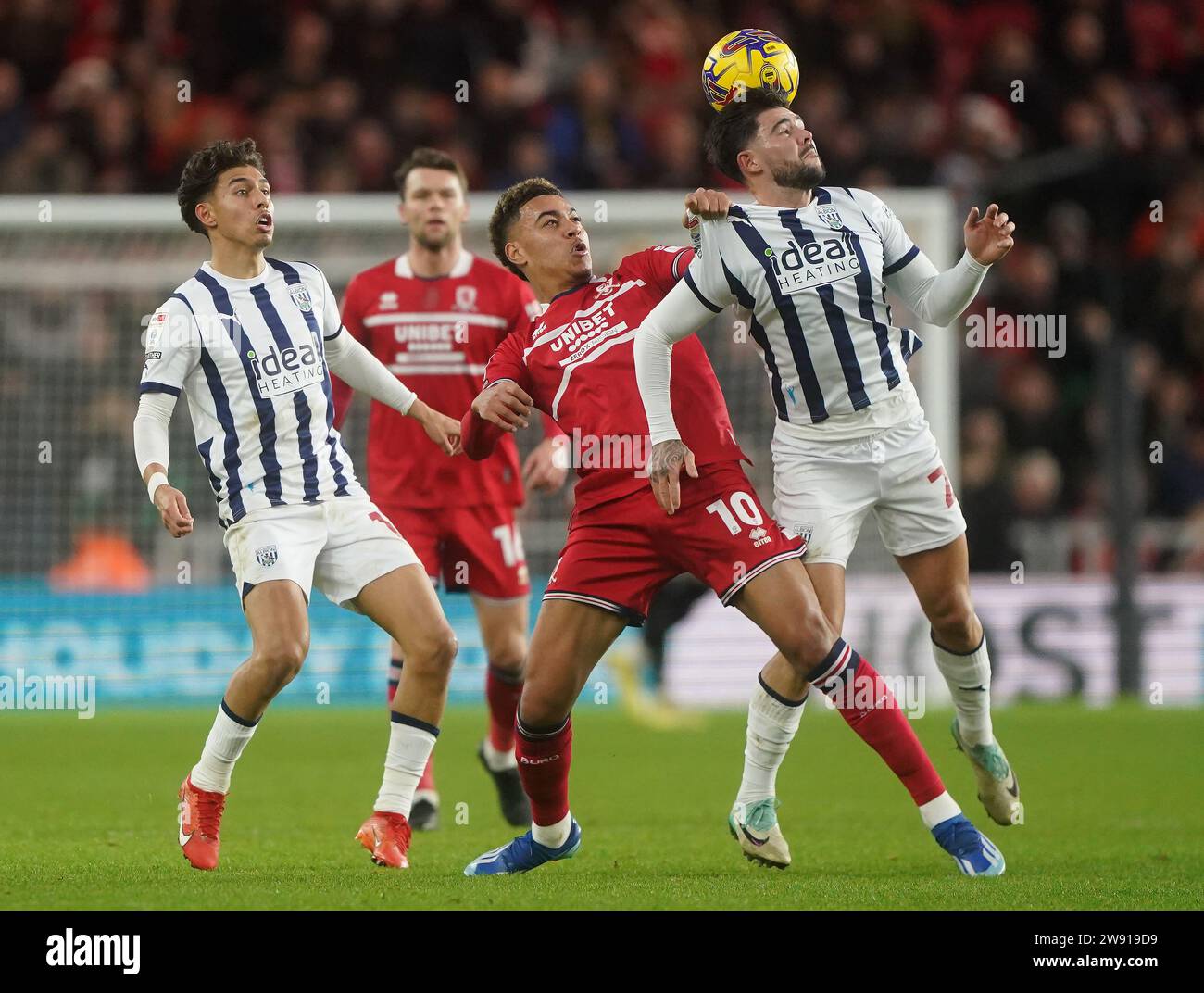 Middlesbrough's Morgan Rogers (centre) and West Bromwich Albion's Alex ...