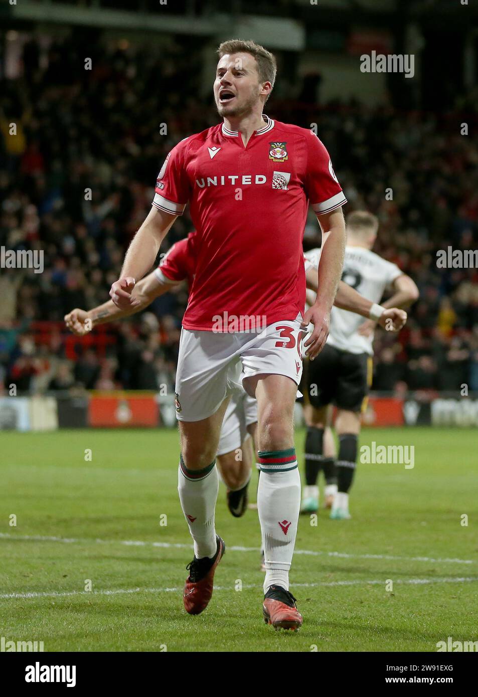 Wrexham’s James Jones celebrates scoring their side's first goal of the ...