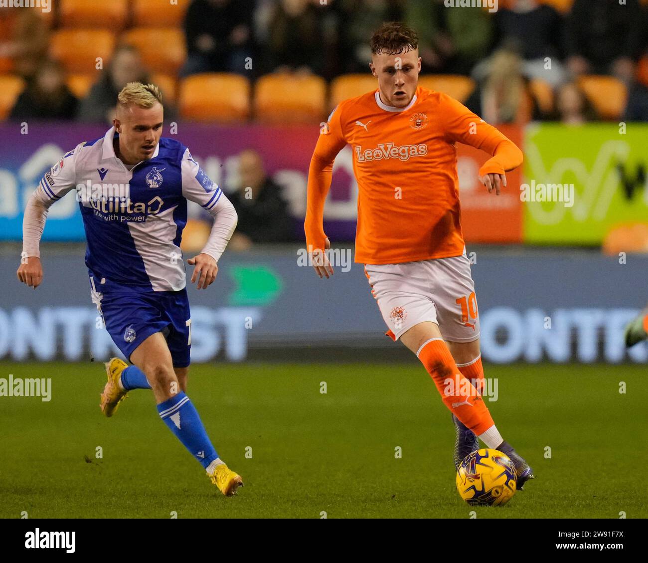 Sonny Carey #10 of Blackpool breaks past Luke Thomas #11 of Bristol ...
