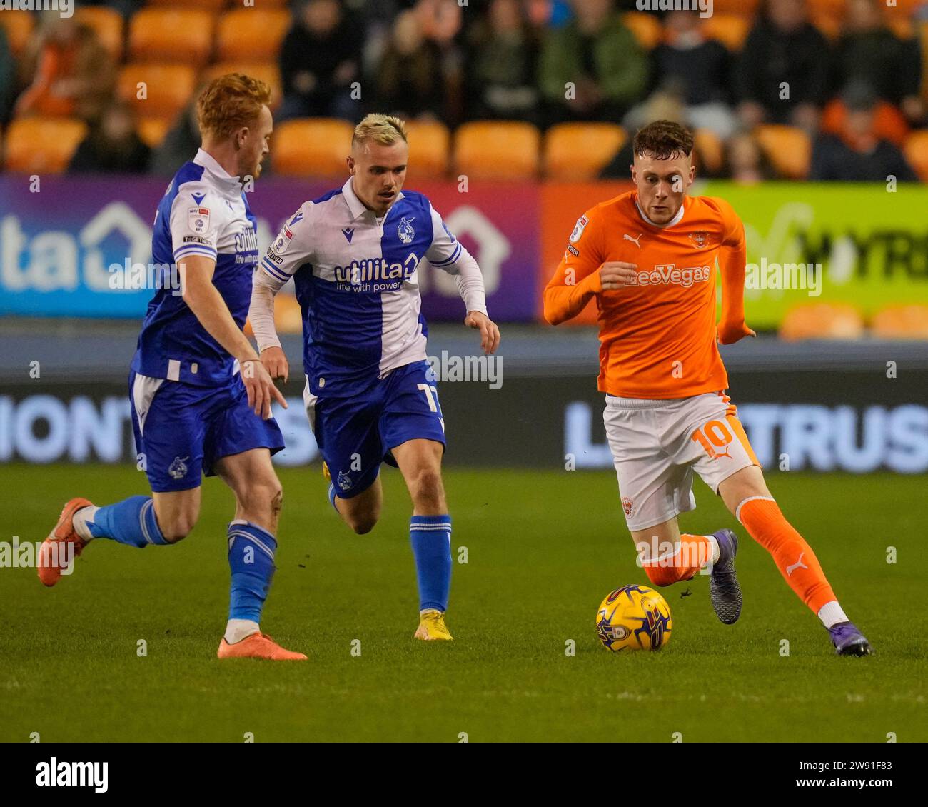 Sonny Carey #10 of Blackpool breaks past Luke Thomas #11 of Bristol ...