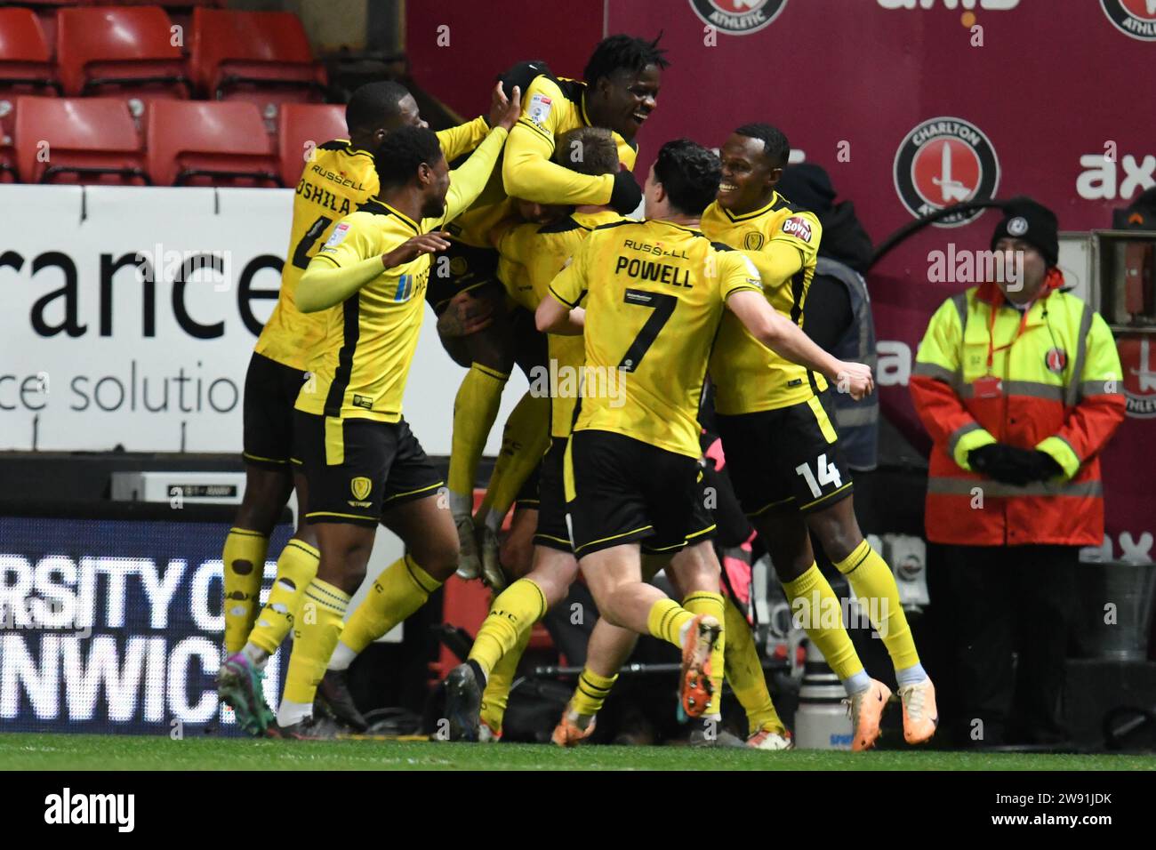 London, England. 23rd Dec 2023. Burton Albion players celebrate after ...