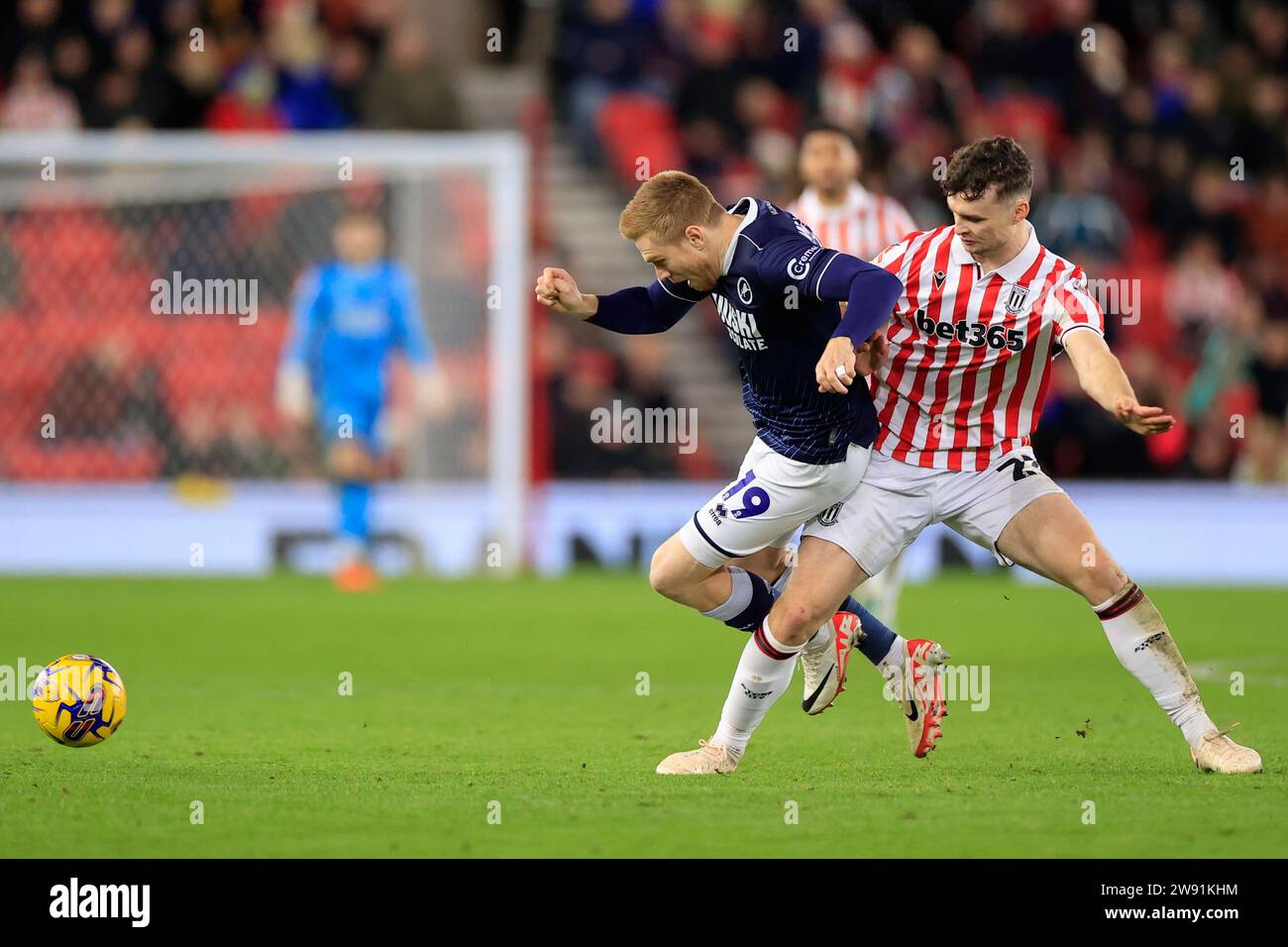 Duncan Watmore #19 of Millwall is challenged by Luke McNally #23 of ...