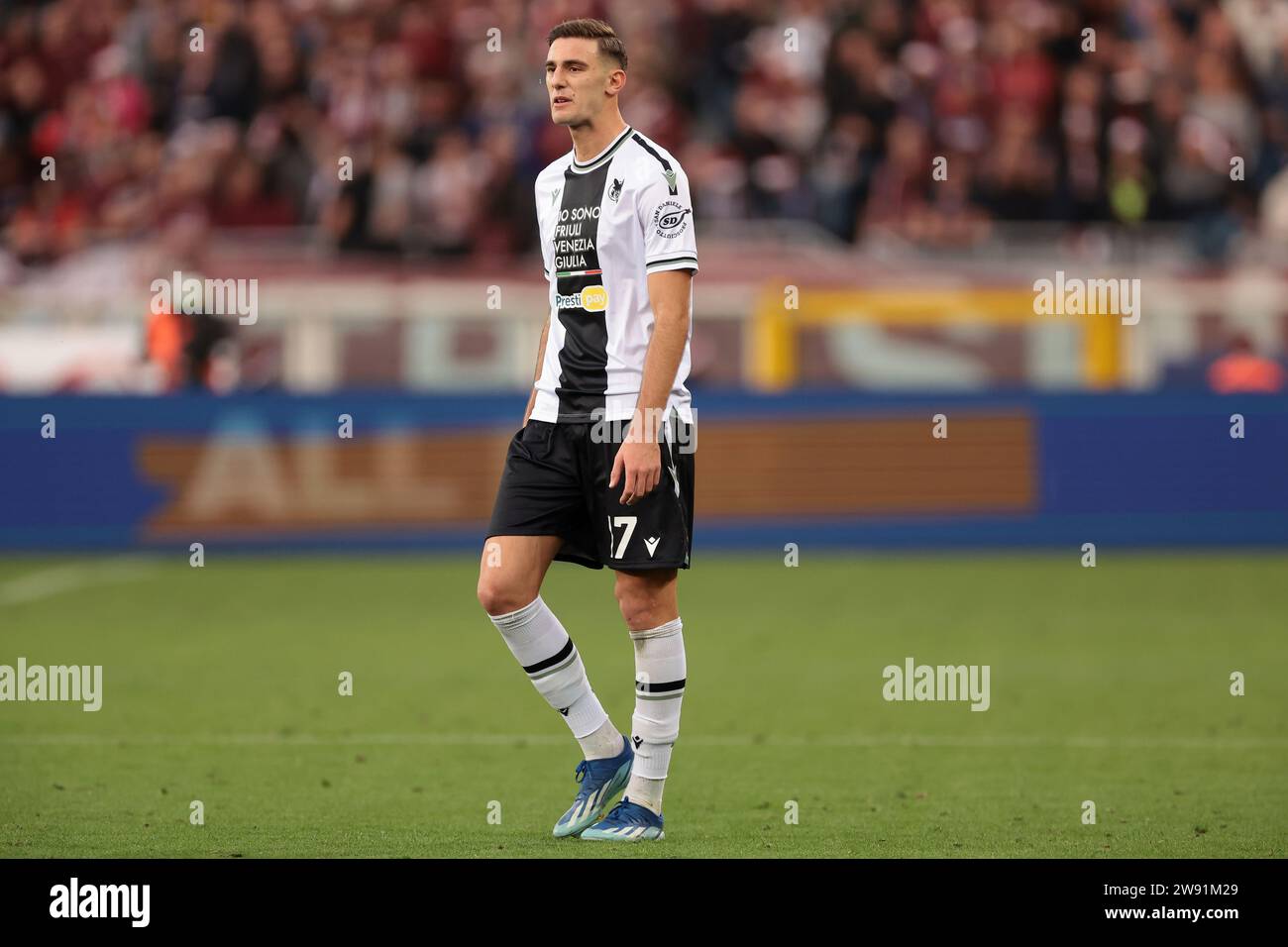 Turin, Italy. 23rd Dec, 2023. Lorenzo Lucca of Udinese Calcio reacts ...