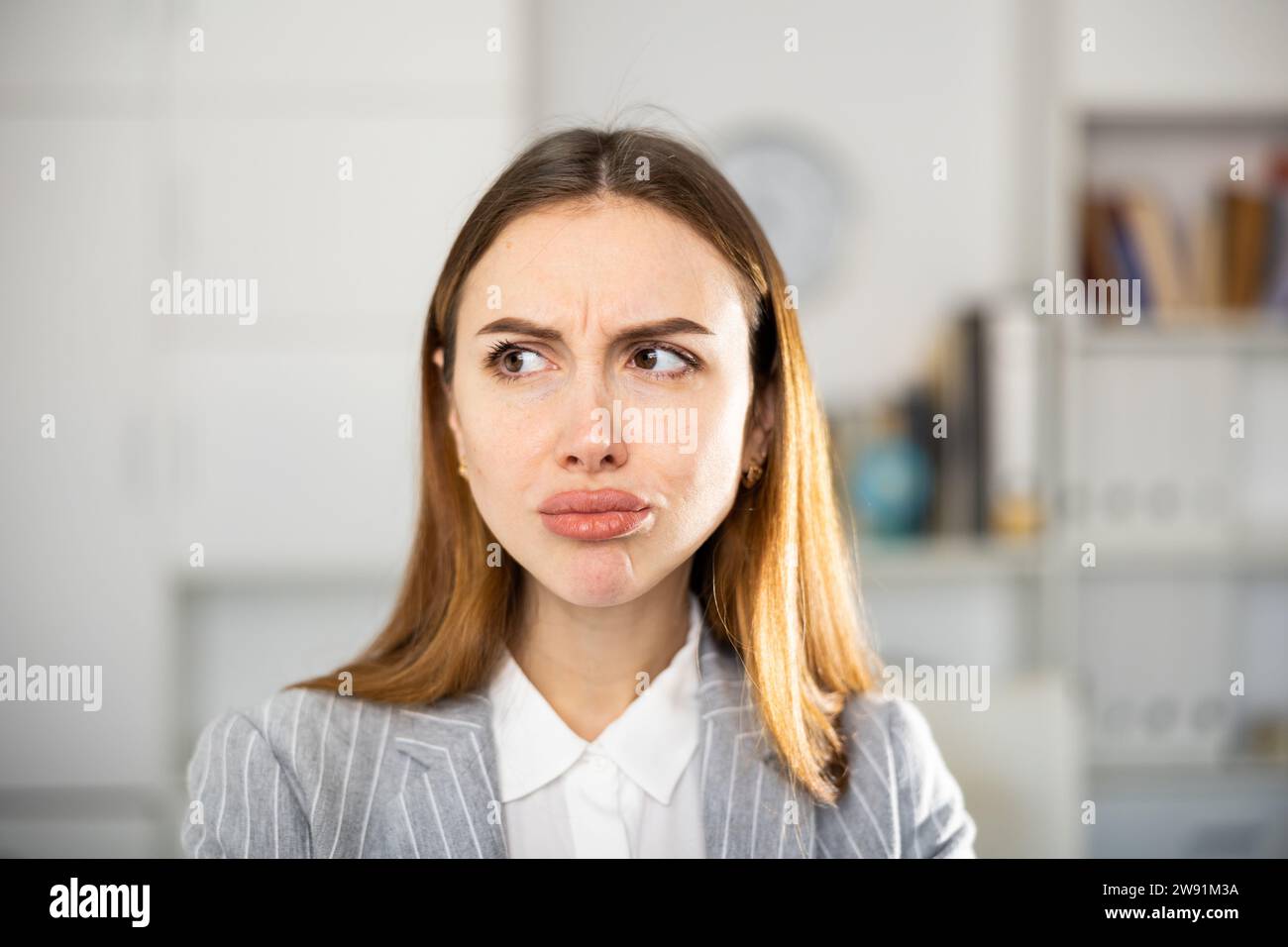 Portrait of unhappy frustrated business lady Stock Photo - Alamy