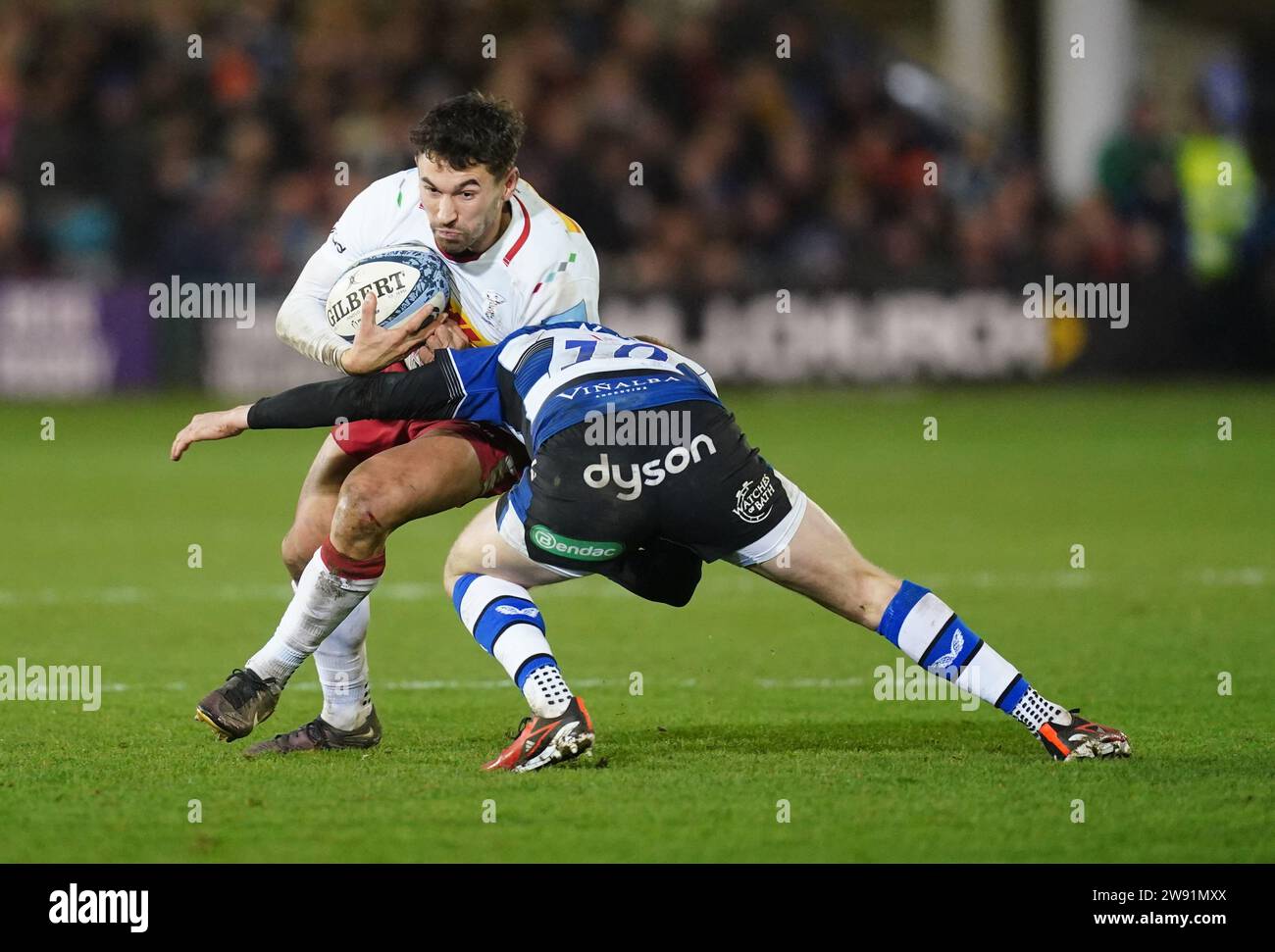 Harlequins Nick David is tackled by Bath's Finn Russell during the ...