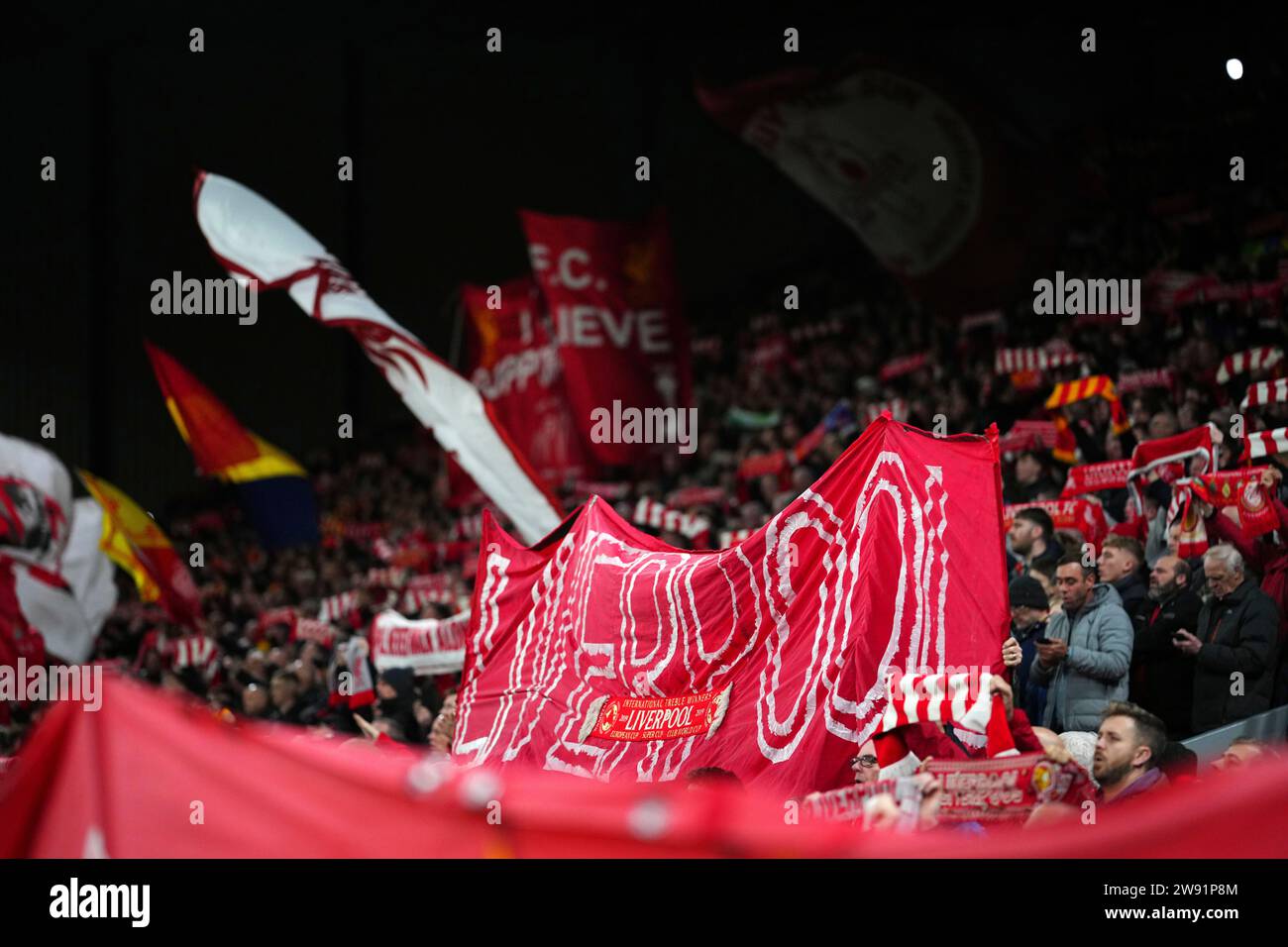 Liverpool fans cheer during the English Premier League soccer match ...