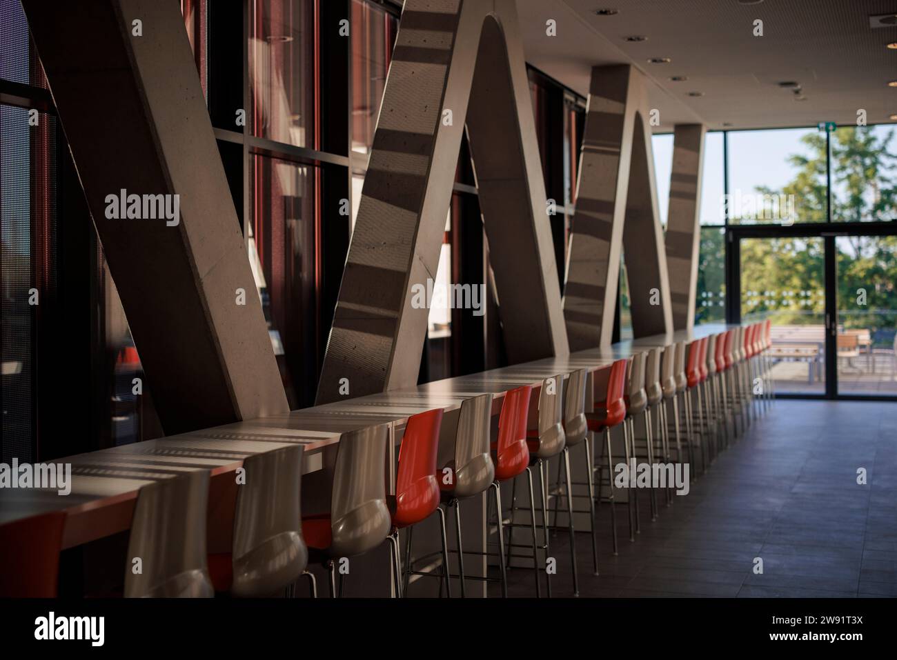 Table with chairs in office cafeteria Stock Photo - Alamy