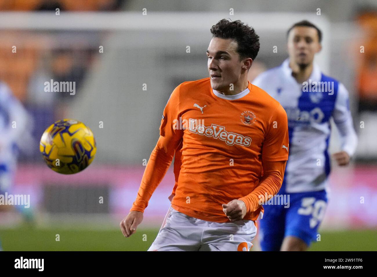 Kyle Joseph #9 of Blackpool chases a through ball during the Sky Bet ...