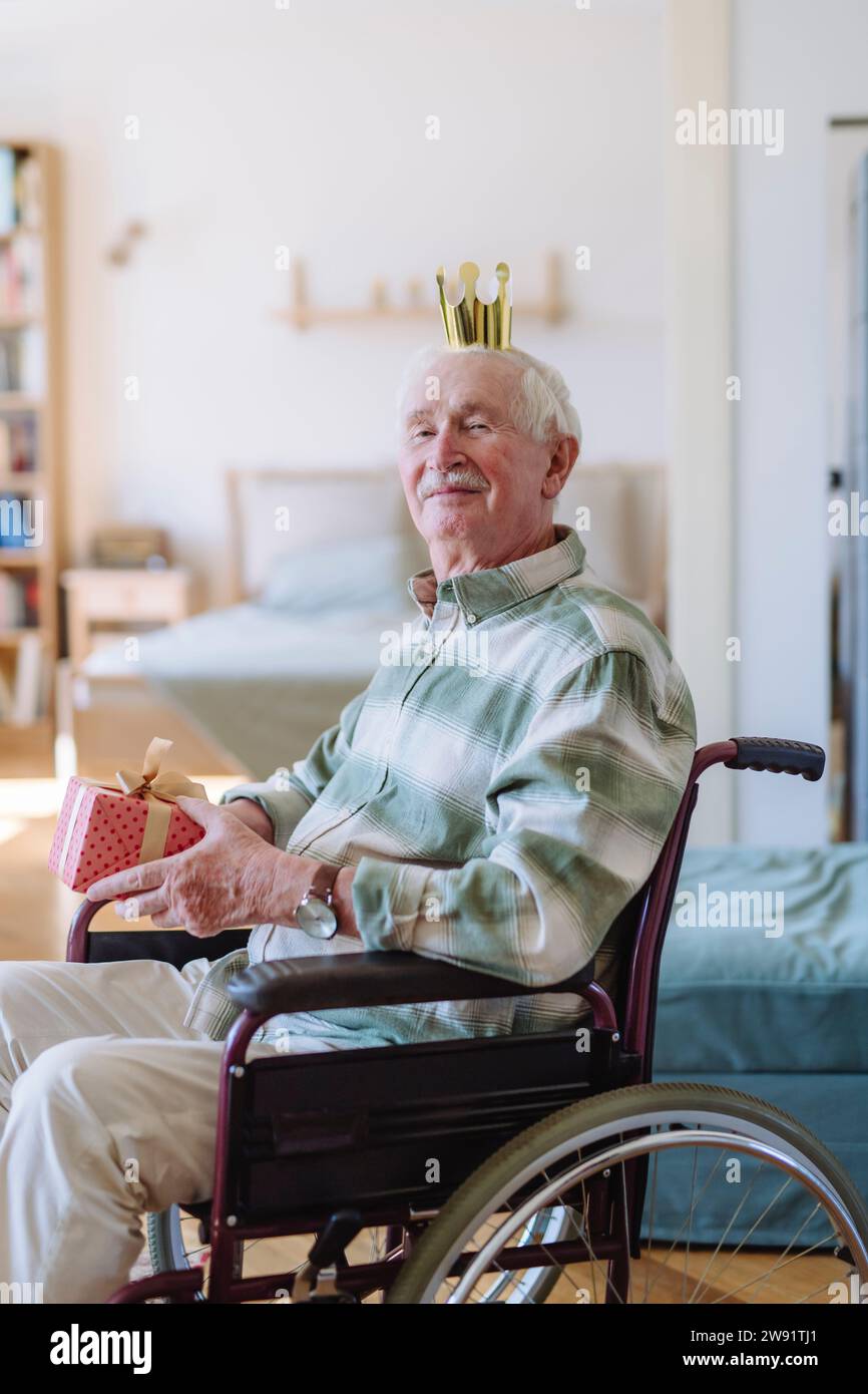 Man holding crown hi-res stock photography and images - Alamy