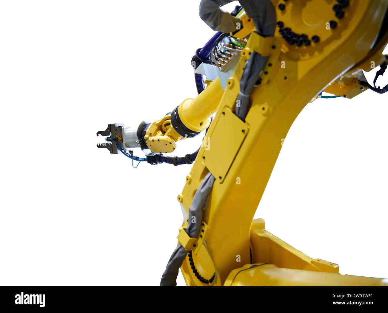 Yellow robotic arm against white background Stock Photo - Alamy