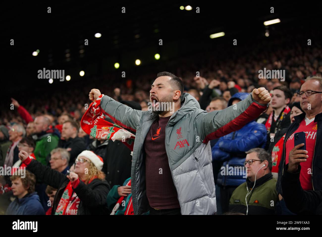 Liverpool fans cheer on their team during the Premier League match at ...