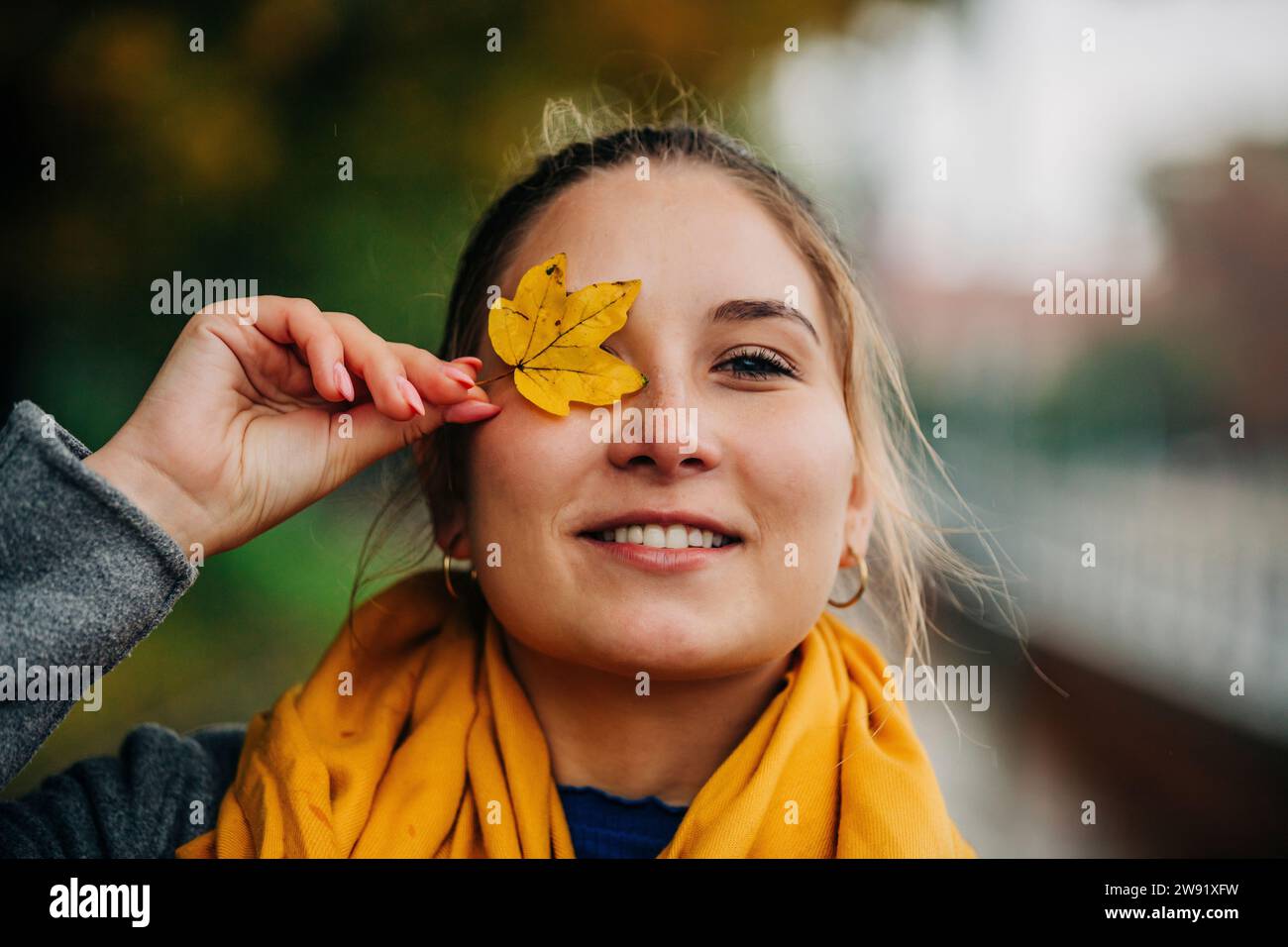 Portrait woman covering eye leaf hi-res stock photography and images ...