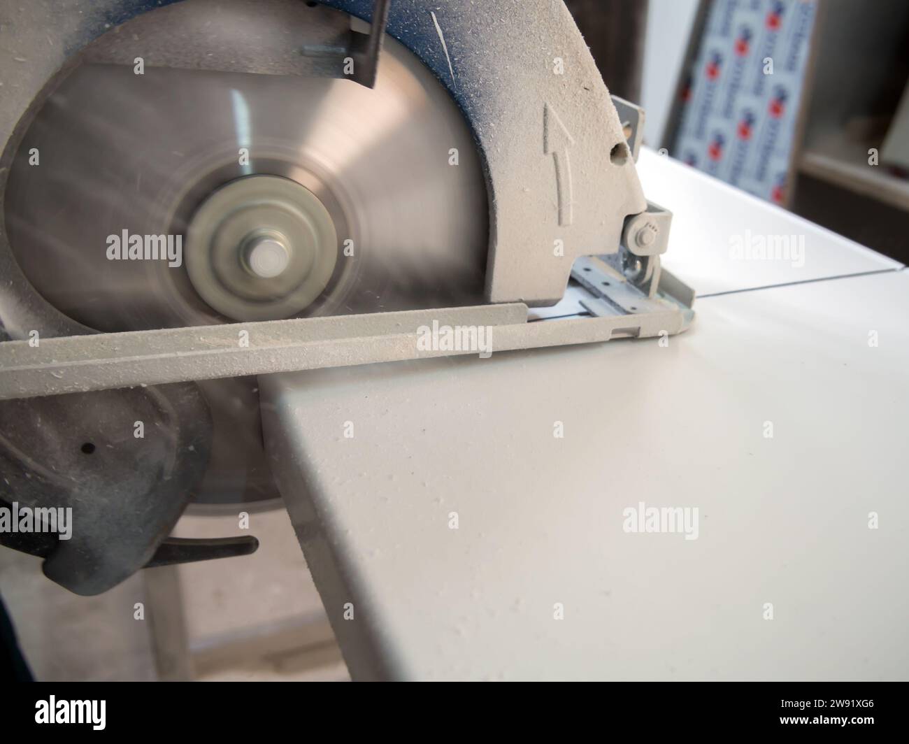 Cutting a window sill blank with a circular saw Stock Photo - Alamy
