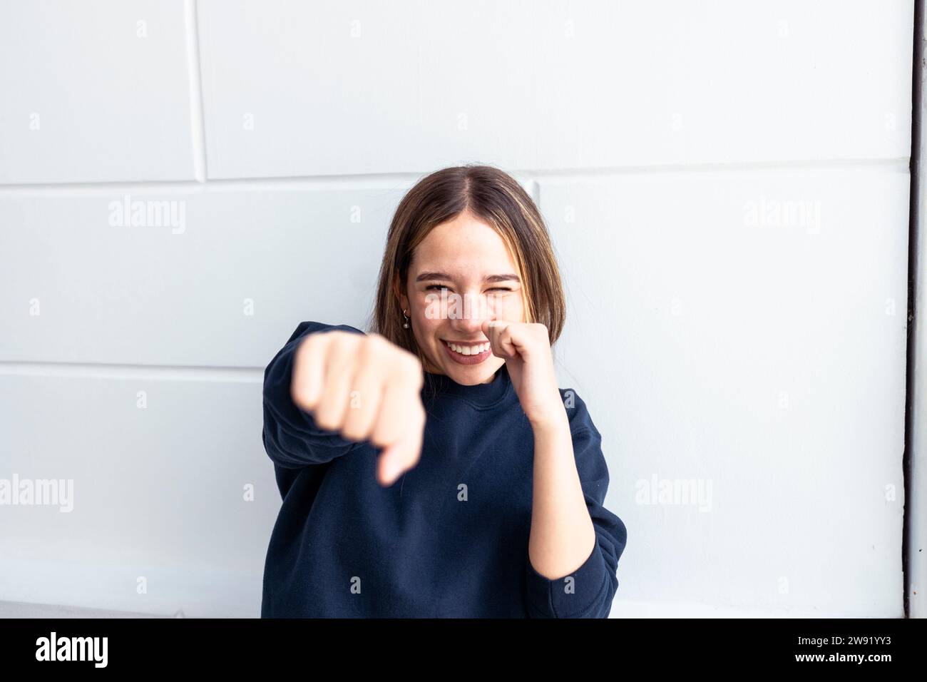 Punching the wall hi-res stock photography and images - Alamy