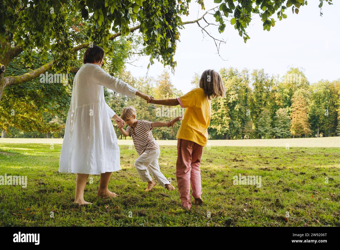 Mother holding daughter playing hi-res stock photography and images - Alamy