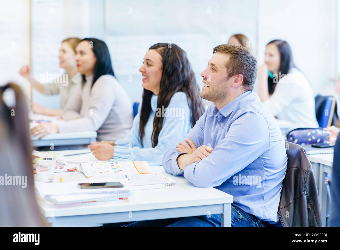 Students sitting desk classroom hi-res stock photography and images - Alamy