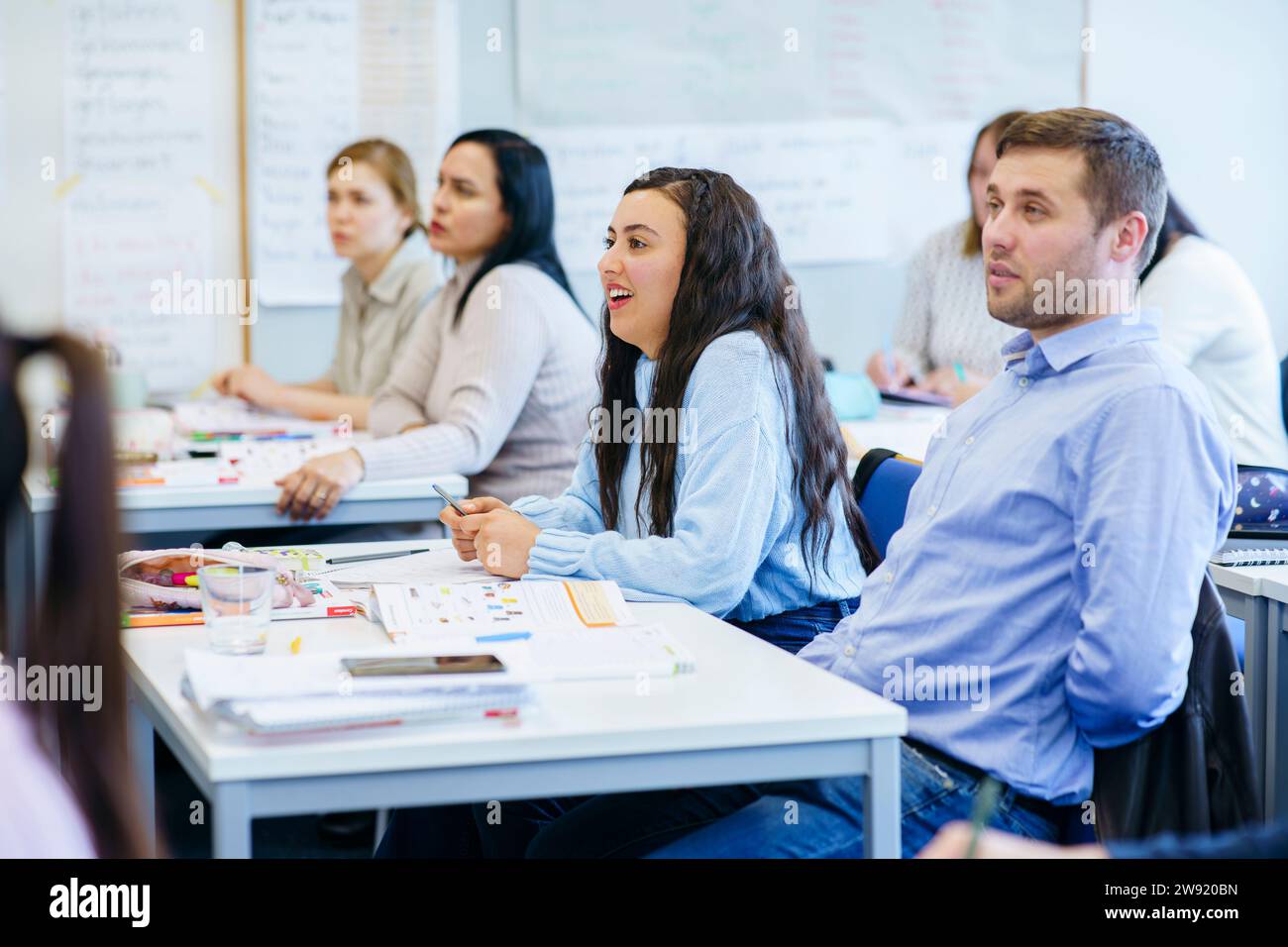 Students sitting desk classroom hi-res stock photography and images - Alamy