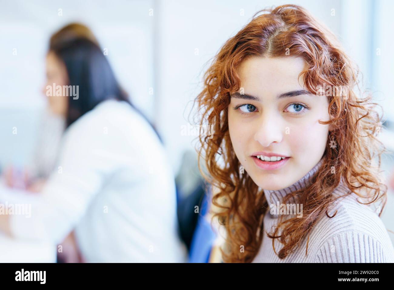 Redhead student with gray eyes in education training class Stock Photo ...