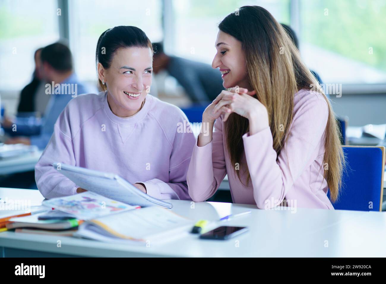 Women in classroom hi-res stock photography and images - Alamy