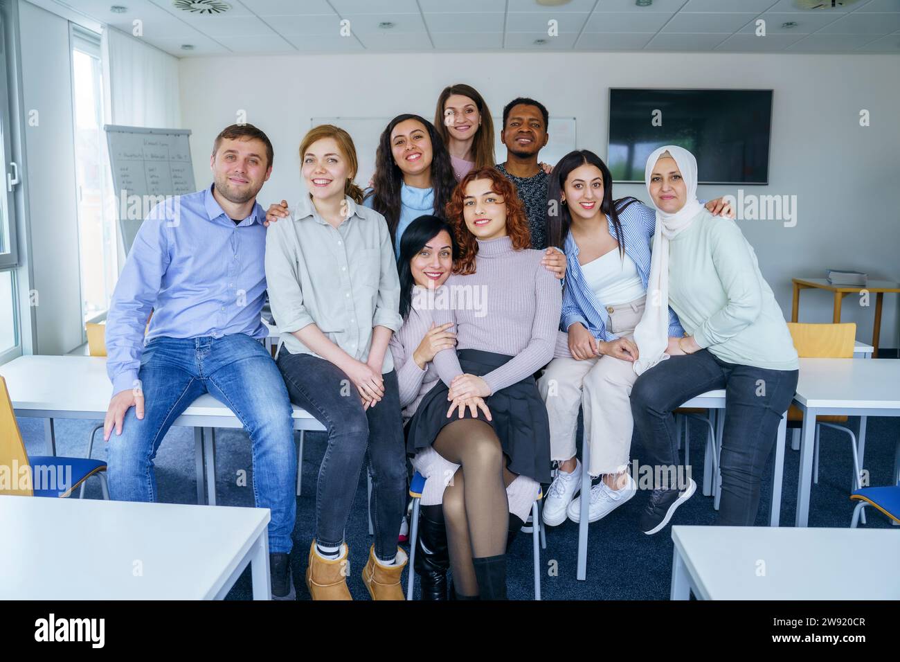 Cheerful smiling adult students hi-res stock photography and images - Alamy