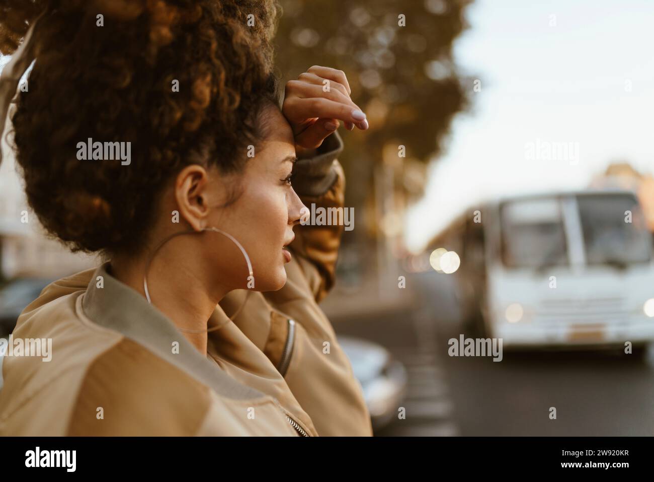 Woman shielding her face hi-res stock photography and images - Alamy