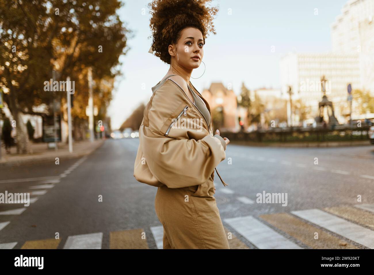 Beautiful women crossing road hi-res stock photography and images - Alamy