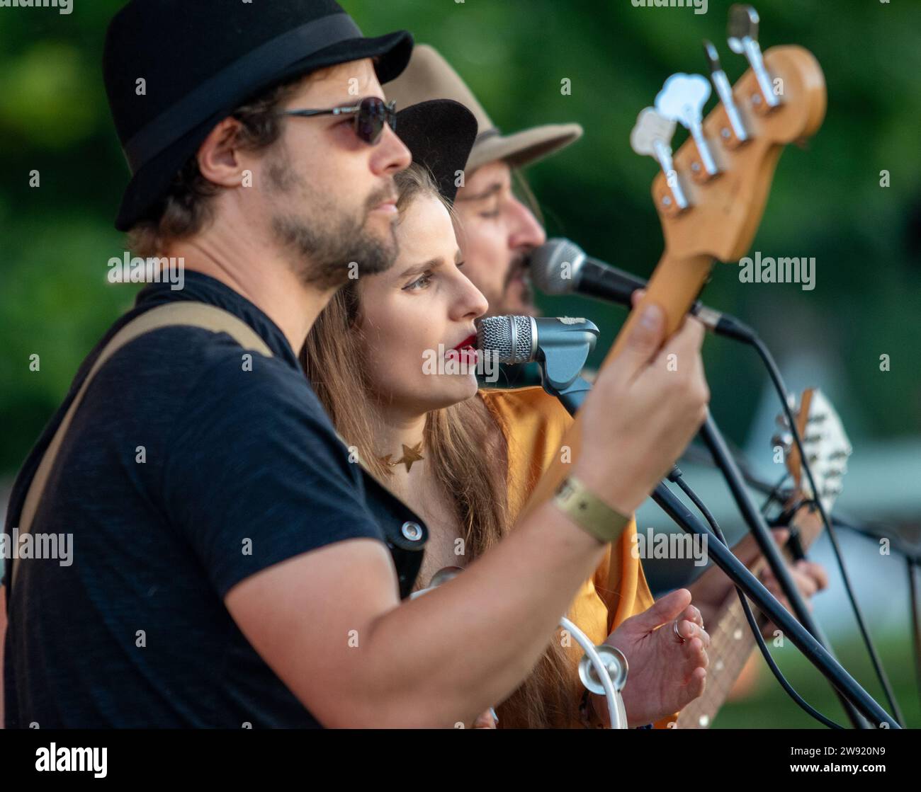 Local woman singer/songwriter Kelly Bayfield on stage with friends at ...
