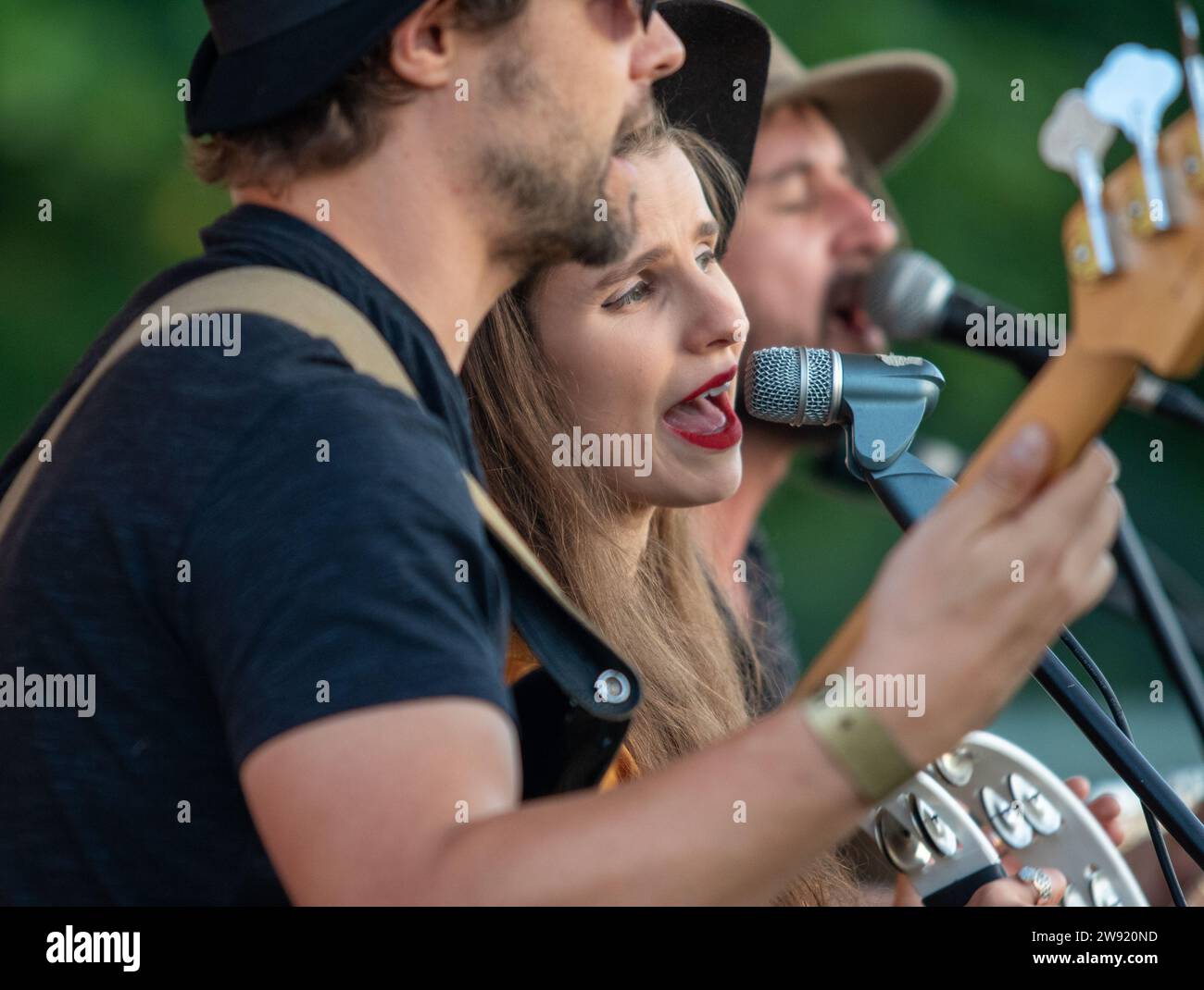 Local woman singer/songwriter Kelly Bayfield on stage with friends at ...