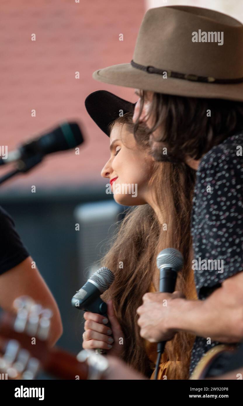 Local woman singer/songwriter Kelly Bayfield on stage with friends at ...