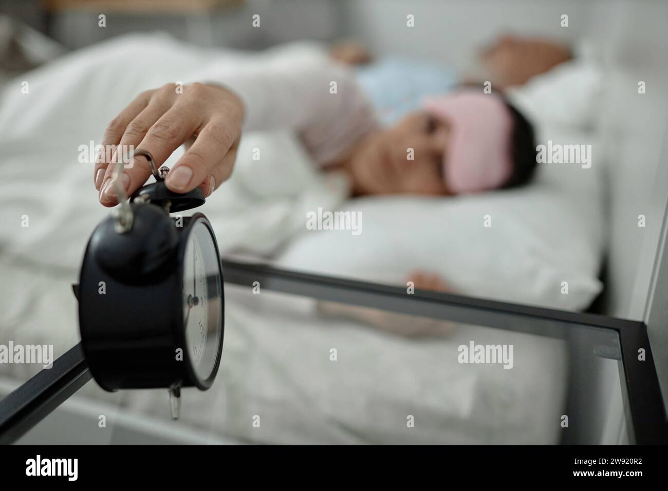 Woman alarm clock table hi-res stock photography and images - Alamy