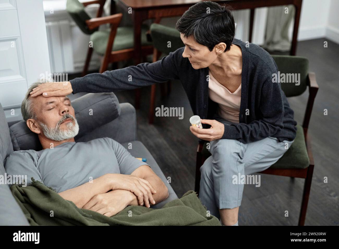 Sick touching hi-res stock photography and images - Alamy