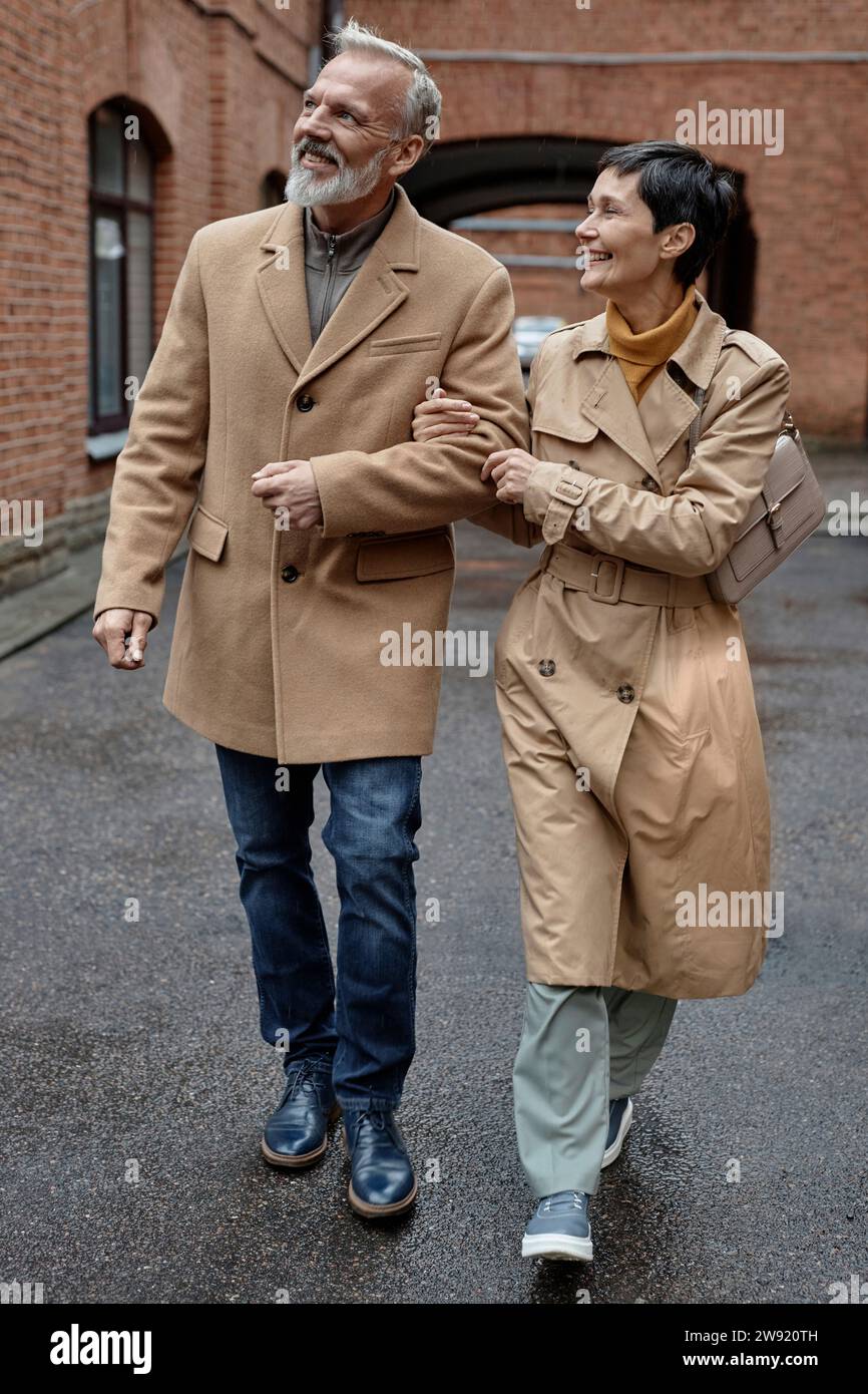 Walk arm arm hi-res stock photography and images - Alamy