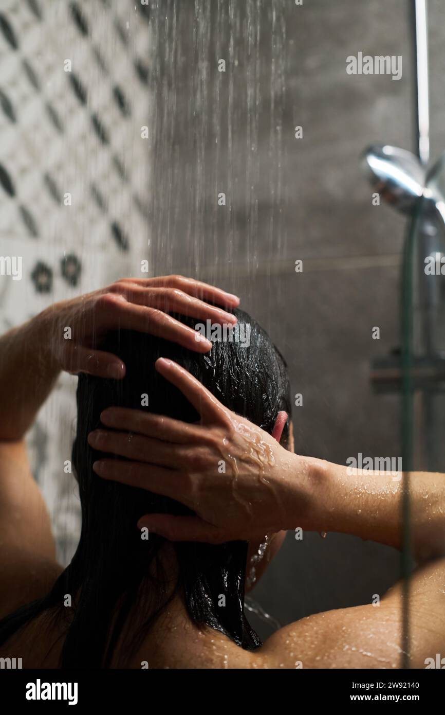 Young woman taking shower hi-res stock photography and images - Alamy