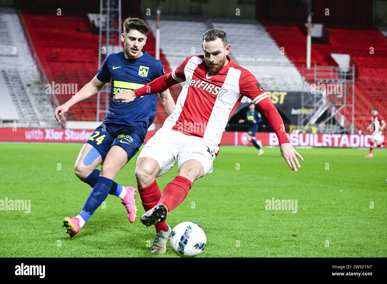 Antwerp, Belgium. 23rd Dec, 2023. Westerlo's Ravil Tagir and Antwerp's ...