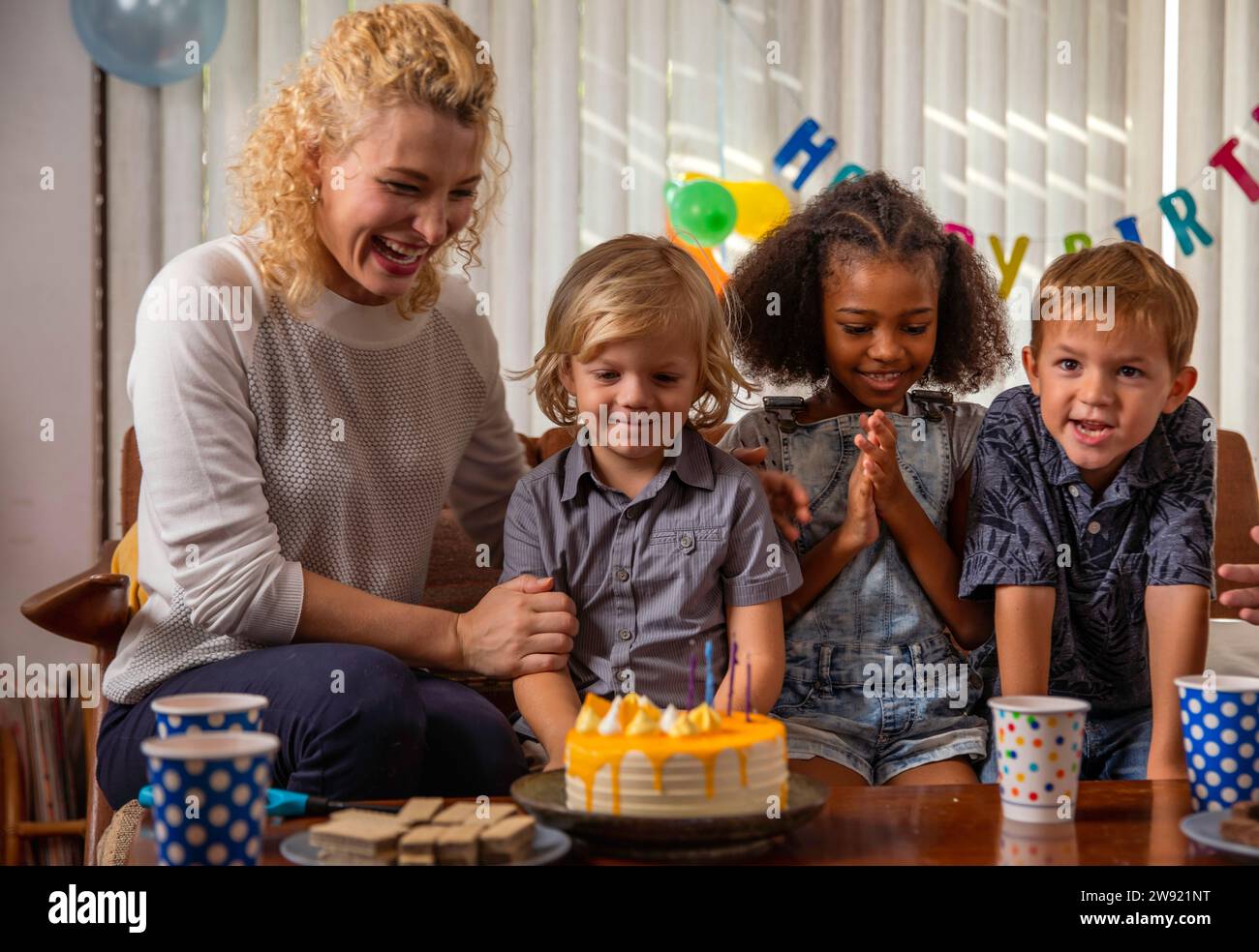 Birthday boy with friends hi-res stock photography and images - Alamy