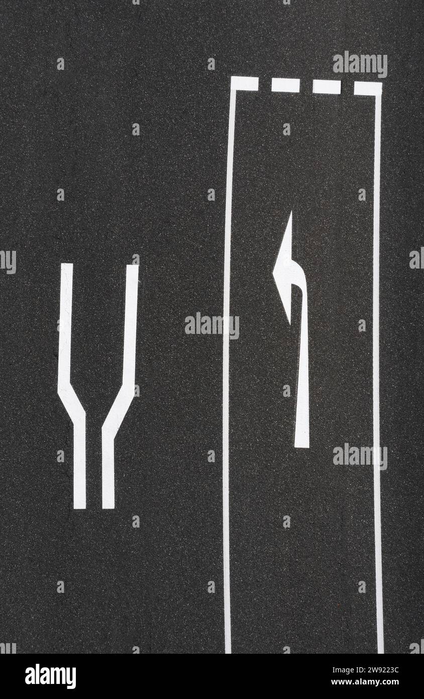 White marking on asphalt hi-res stock photography and images - Alamy