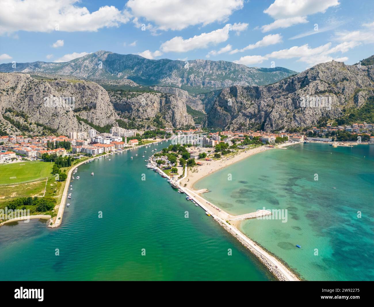 Croatia, Split-Dalmatia County, Omis, Aerial view of town on Cetina river and surrounding ...