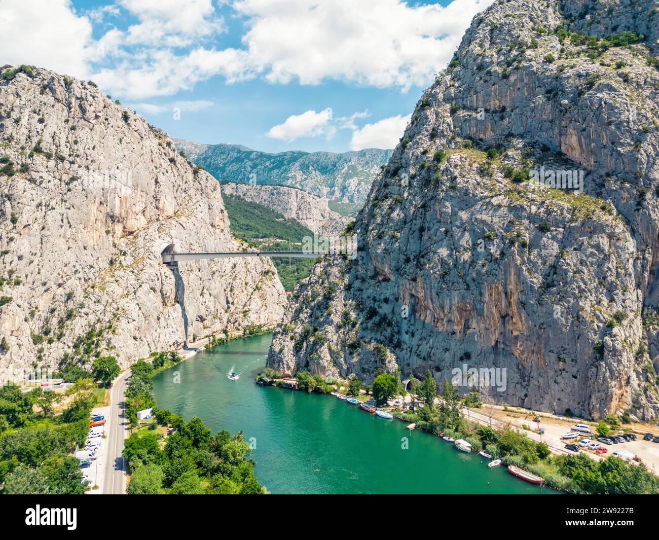 Croatia, Split-Dalmatia County, Aerial view of Cetina river flowing between steep mountains in ...